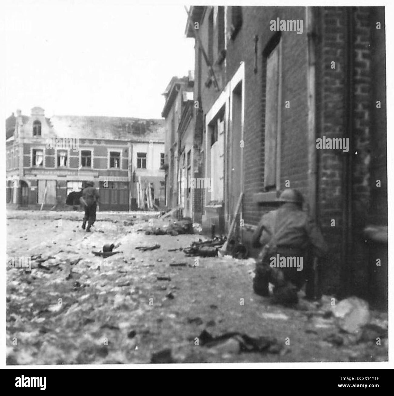 12 CORPS ADVANCE - Troops of the 2nd Bn Devons clearing the Northern ...