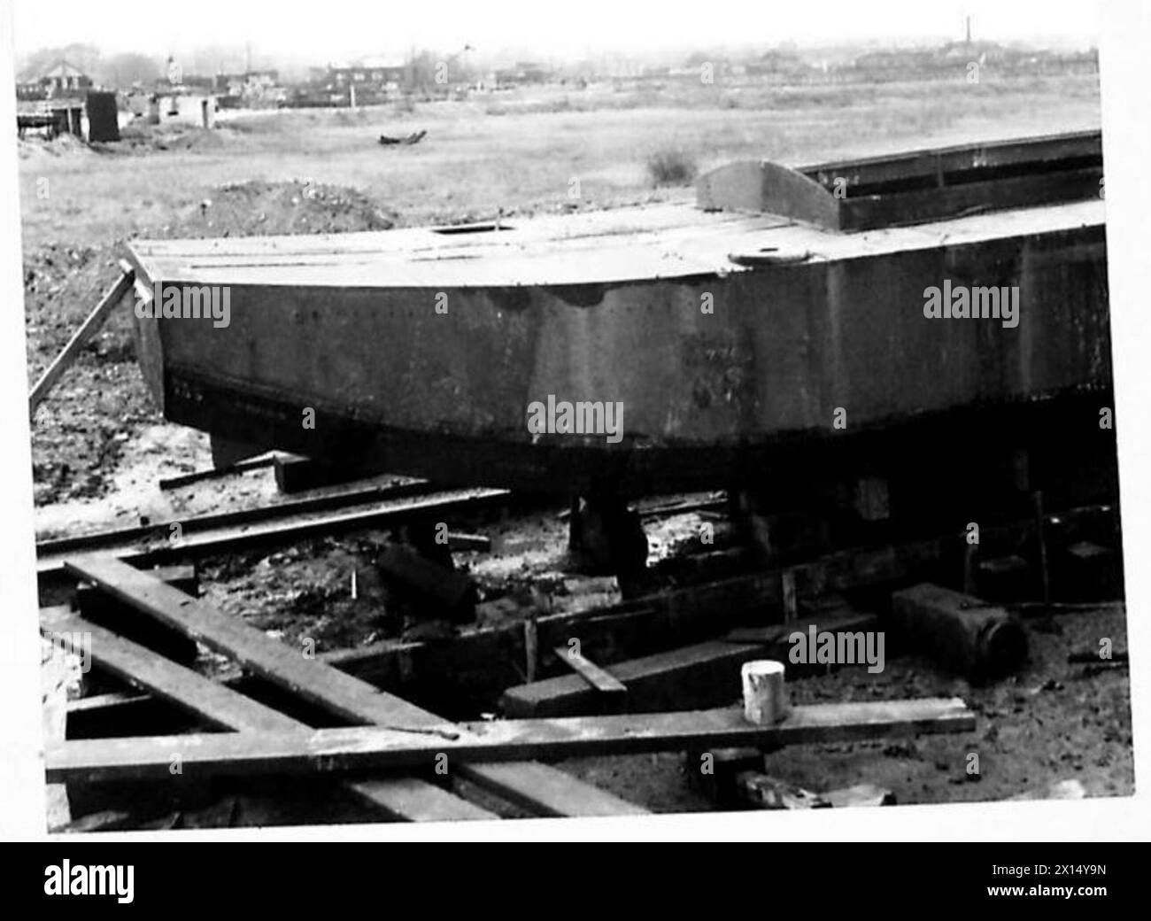 Royal Engineers assemble a 60 ft. barge, with focus on the forward end ...