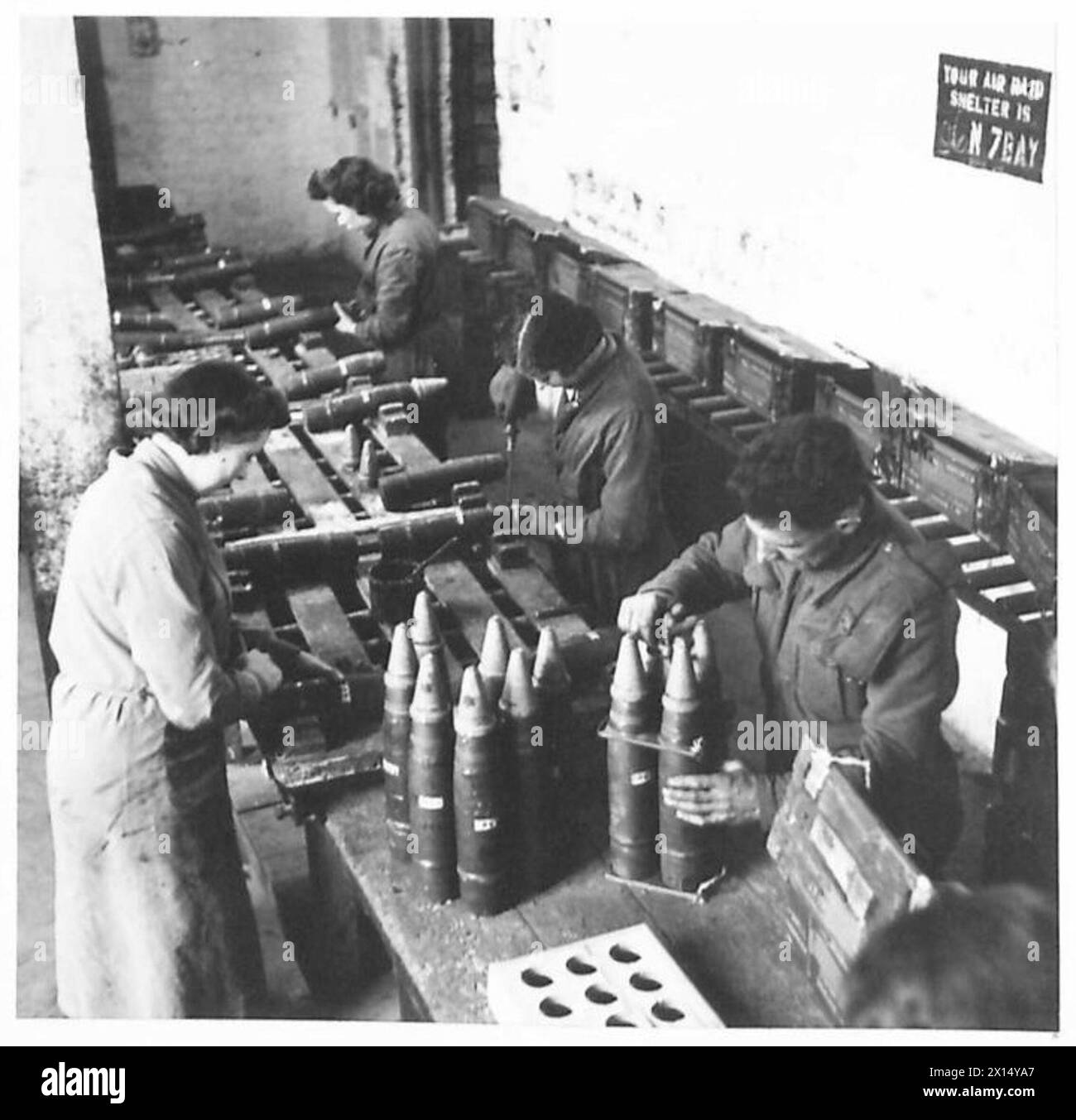 ATS SALVAGE AMMUNITION - Auxiliaries at work in the renovation shed. A ...