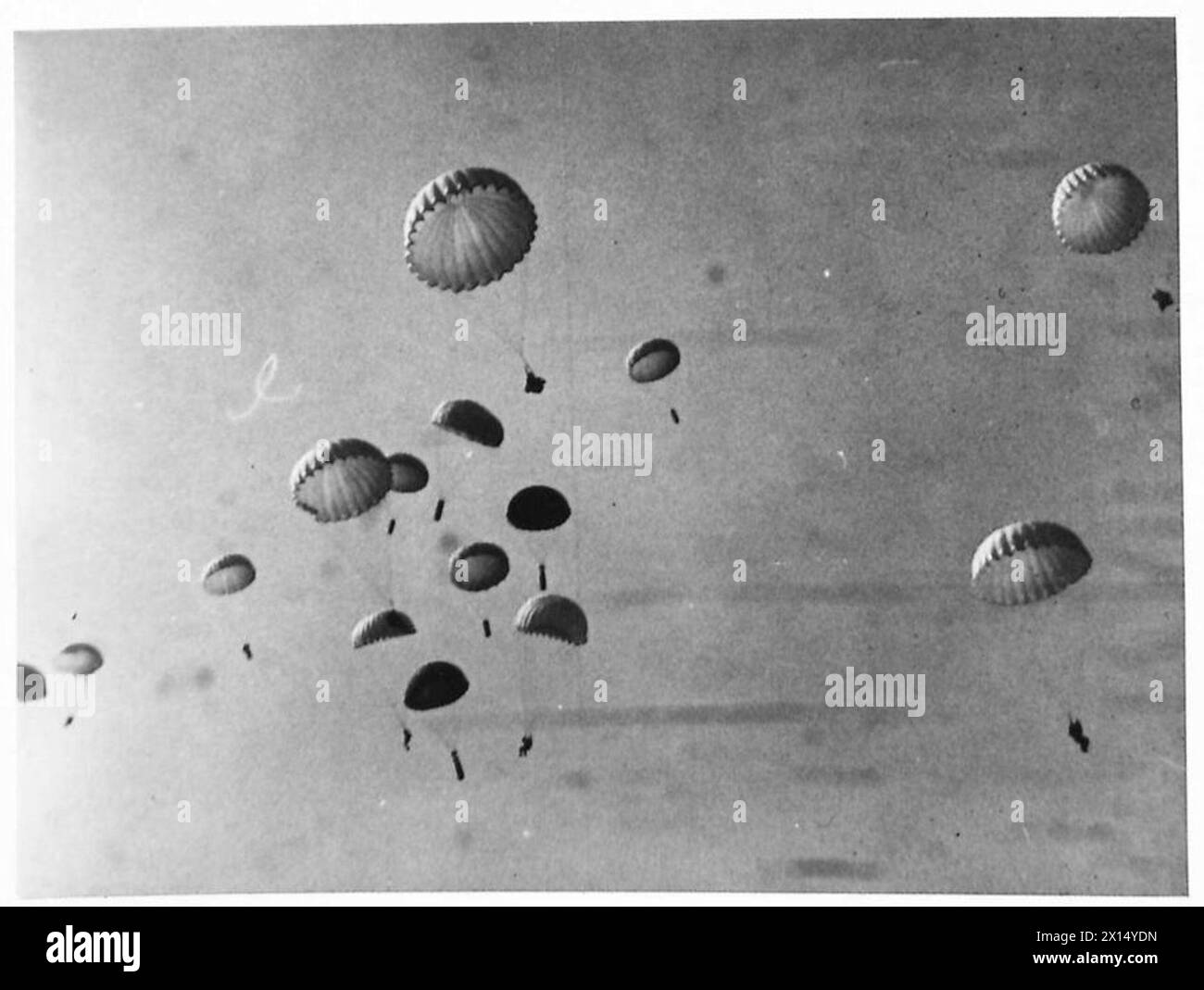BRITAIN'S PARACHUTE TROOPS IN TRAINING - Parachute troops descending ...