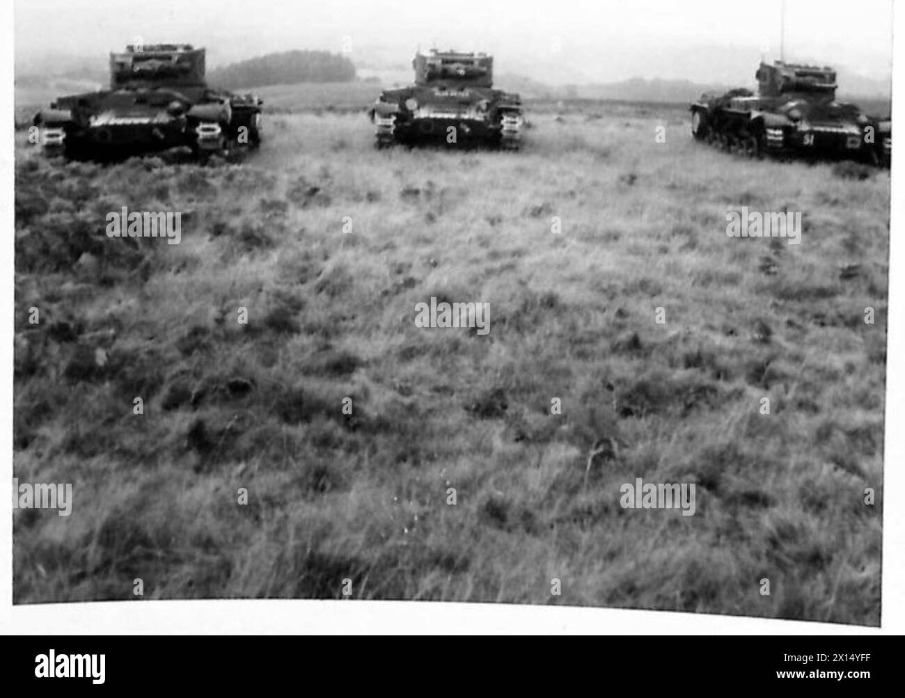 VALENTINE TANKS - Three of the tanks operating on a moor , British Army ...