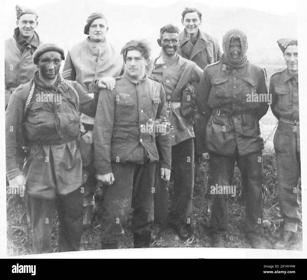 A group of British Commandos is shown returning from a raid near ...