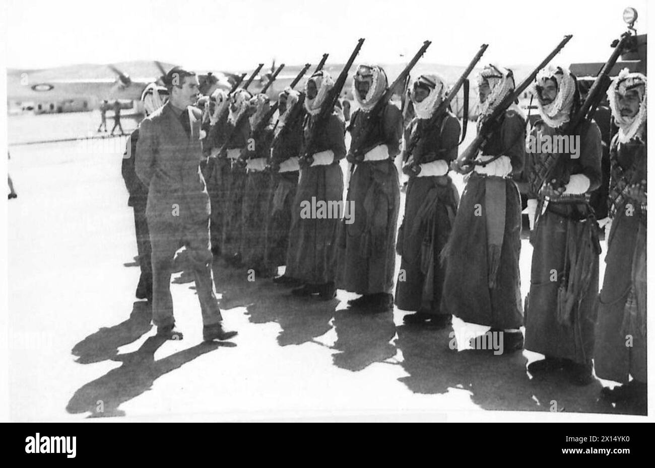 MR. EDEN'S VISIT TO PALESTINE - S. of S. inspecting a unit of the Arab ...