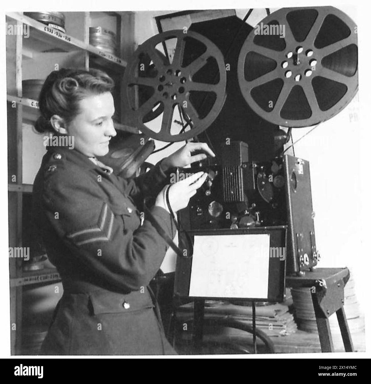 ATS PROJECTIONISTS - Corporal Duckett, ATS film projectionist, lacing ...