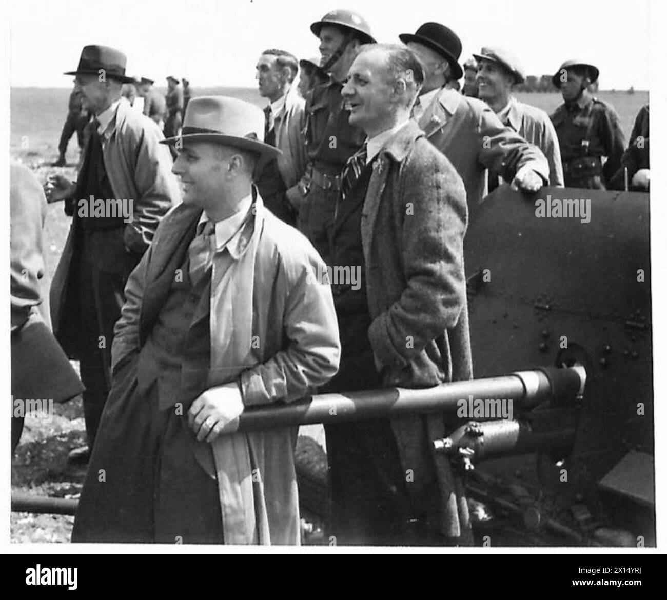 WORKERS SEE THE GUNS THEY HELPED TO MAKE - Workers watching the guns in ...
