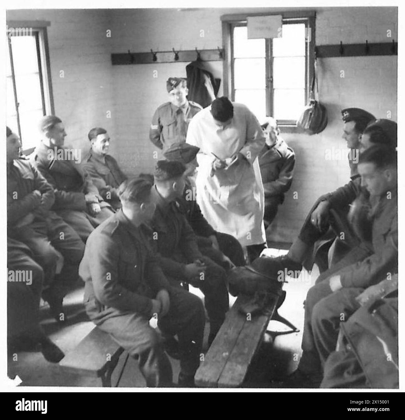 Army dental staff record patient details in the waiting room as part of ...