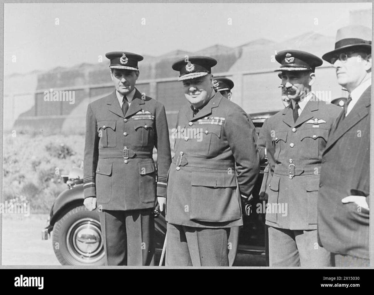 AIR COMMODORE CHURCHILL VISITS R.A.F. BOMBER STATION - 5456 Left to right - The Prime Minister ...