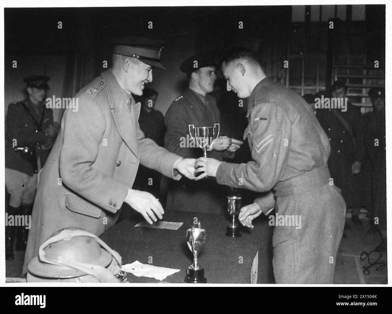 SOLDIER WALKERS - Corporal Stott receiving the individual cup, for ...