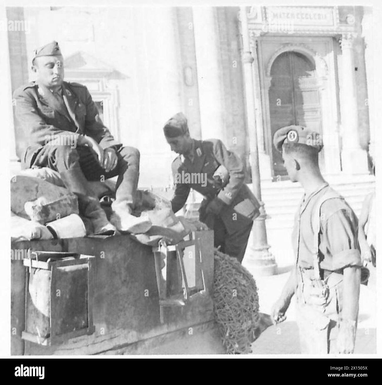 INVASION OF SICILY - Italian officers captured in Rosolini boarding a ...