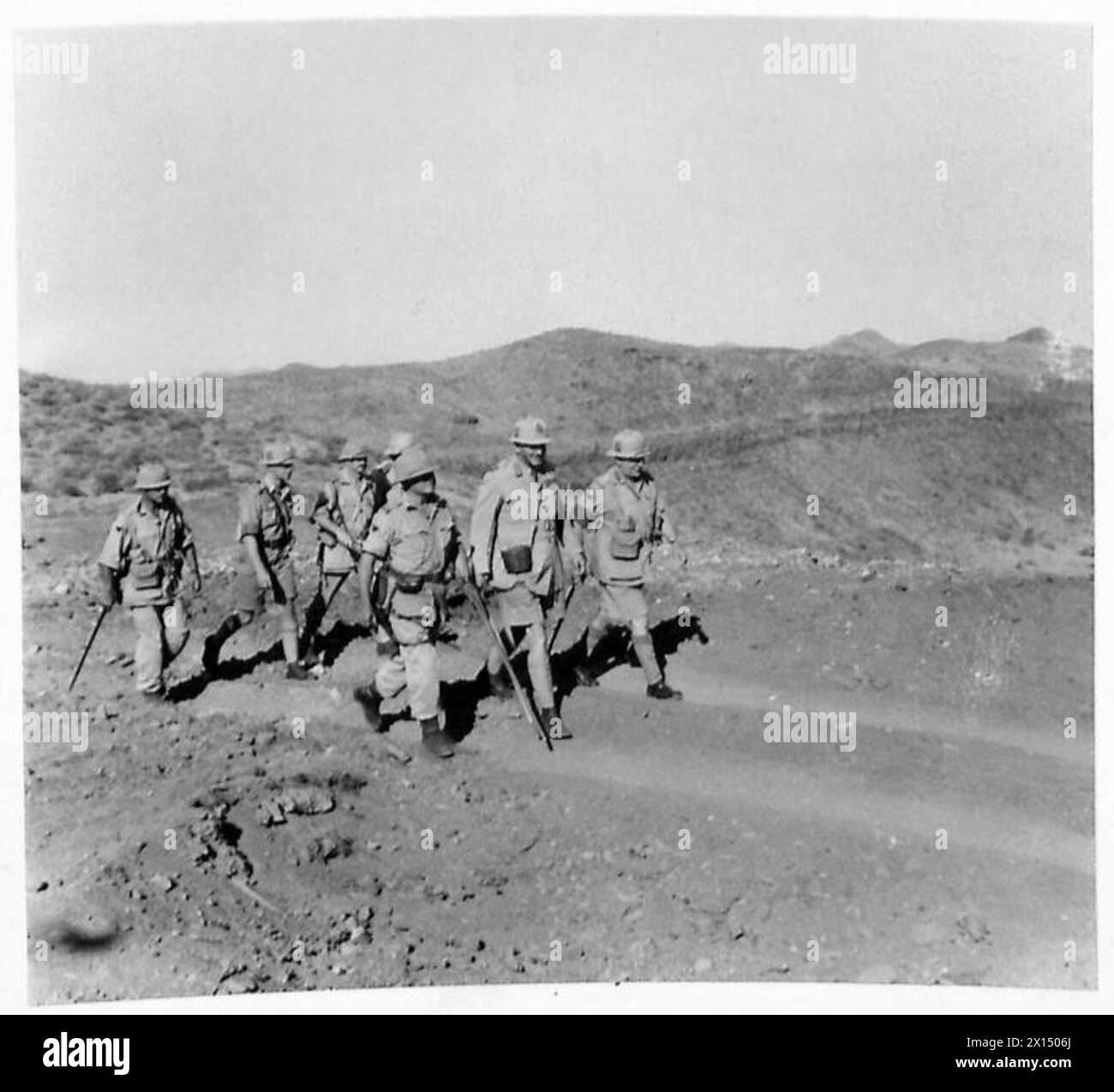 MAJOR-GENERAL G.E. BRINK, D.S.O. INSPECTS THE FORWARD POSITIONS ON THE ...