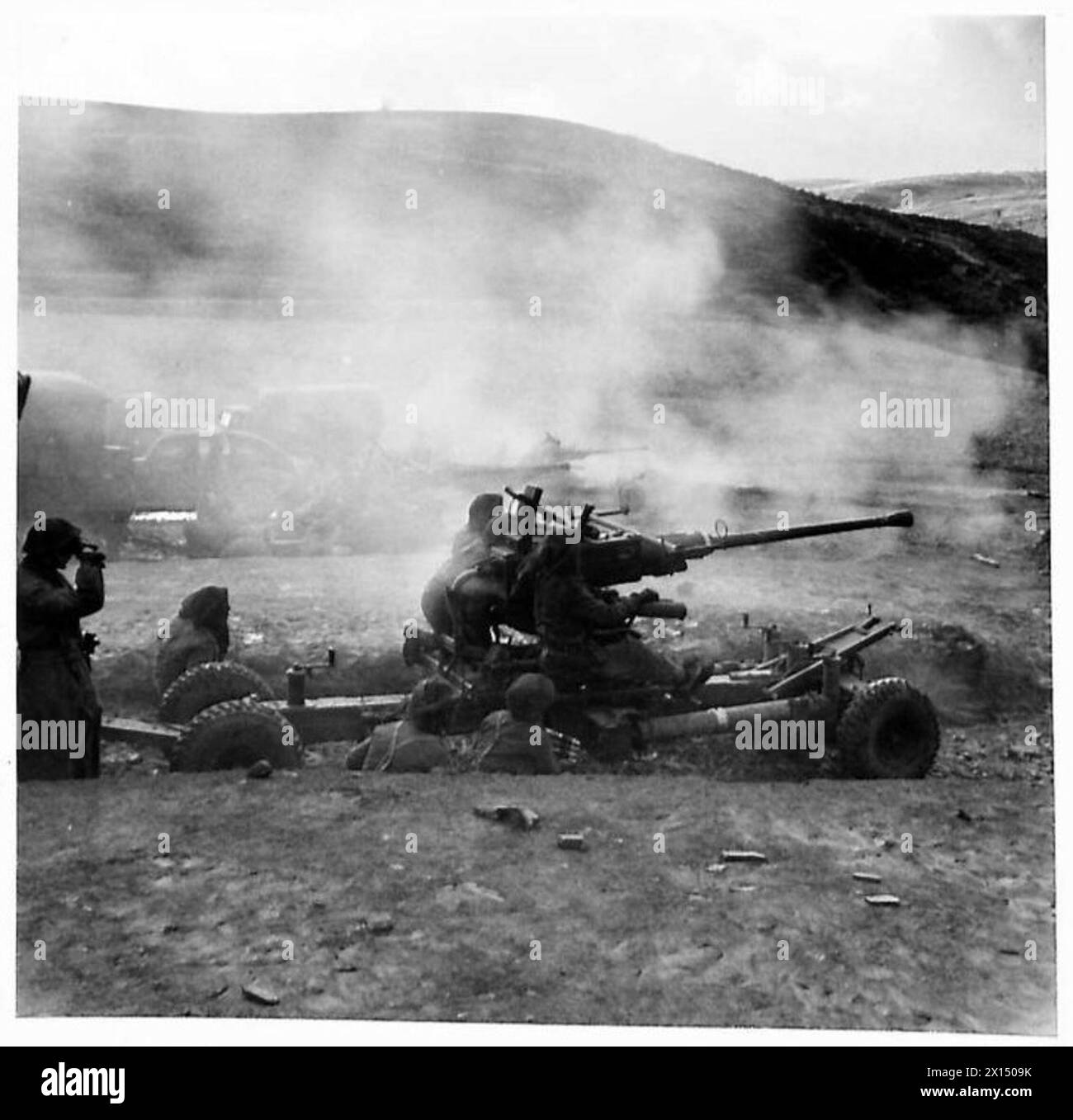 GUN DRILL ON THE RANGES - A Bofors gun in action on the ranges ...