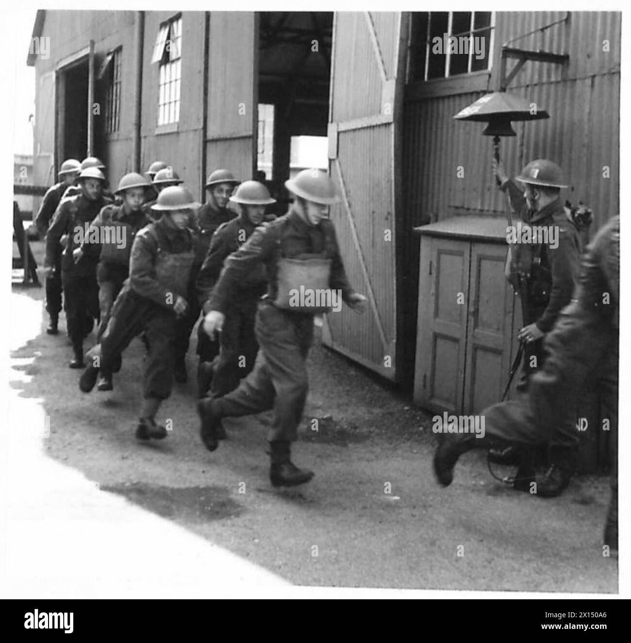 Firefighting practice exercise Black and White Stock Photos & Images ...