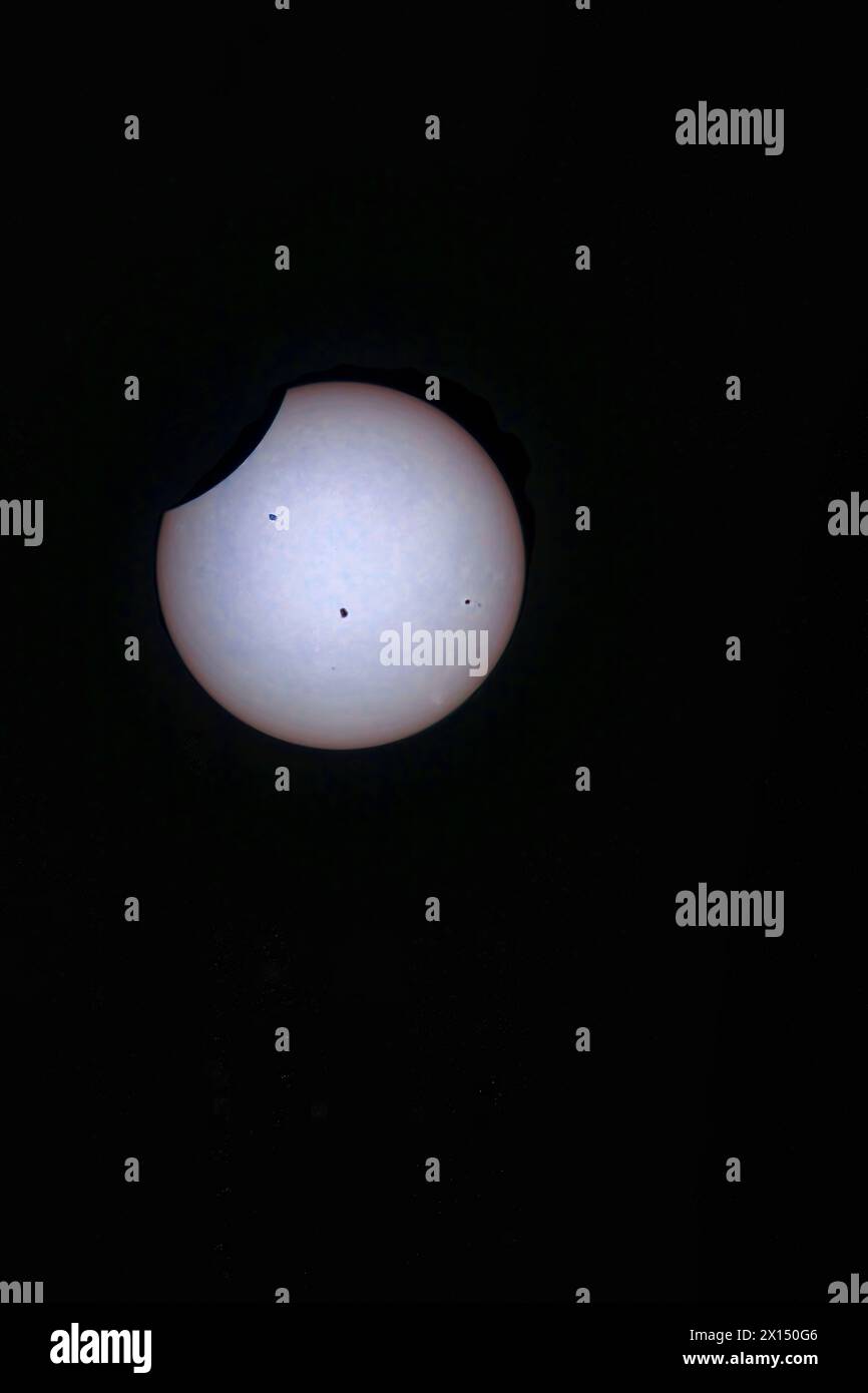 Partial eclipse of the Sun seen from space. Digital enhancement of an ...