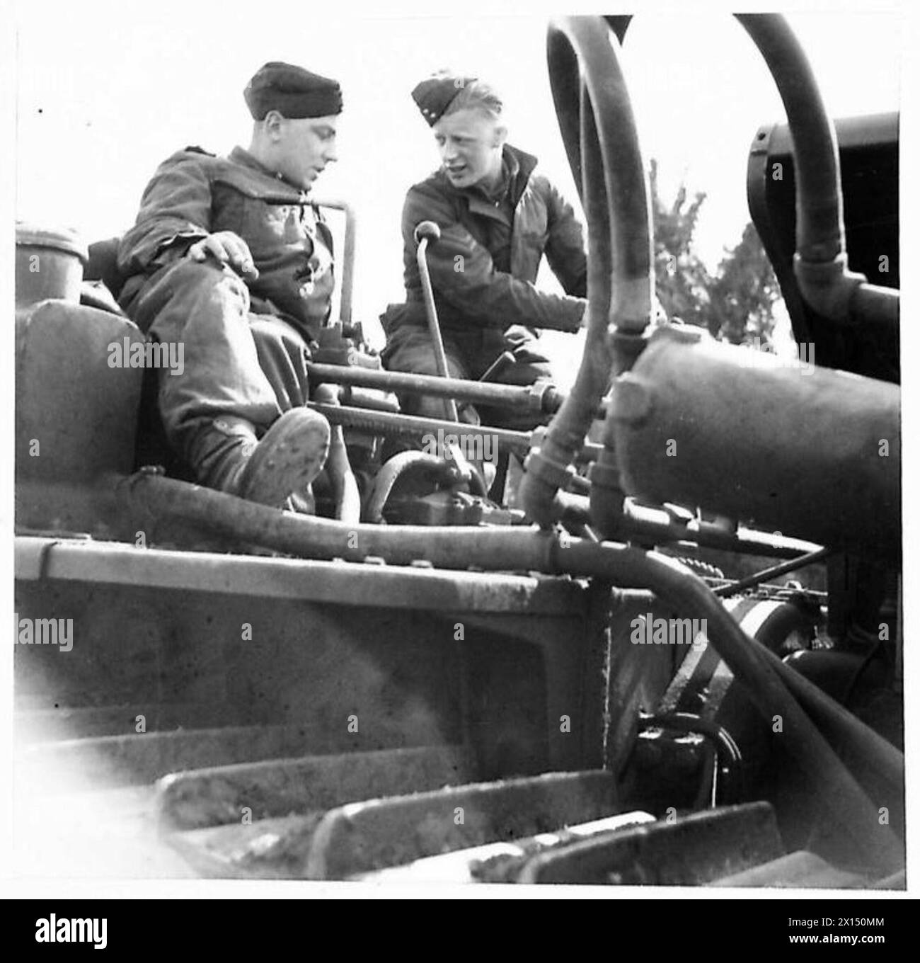 ARMY MOTOR TRACTOR SCHOOL - A corporal instructor at the controls ...