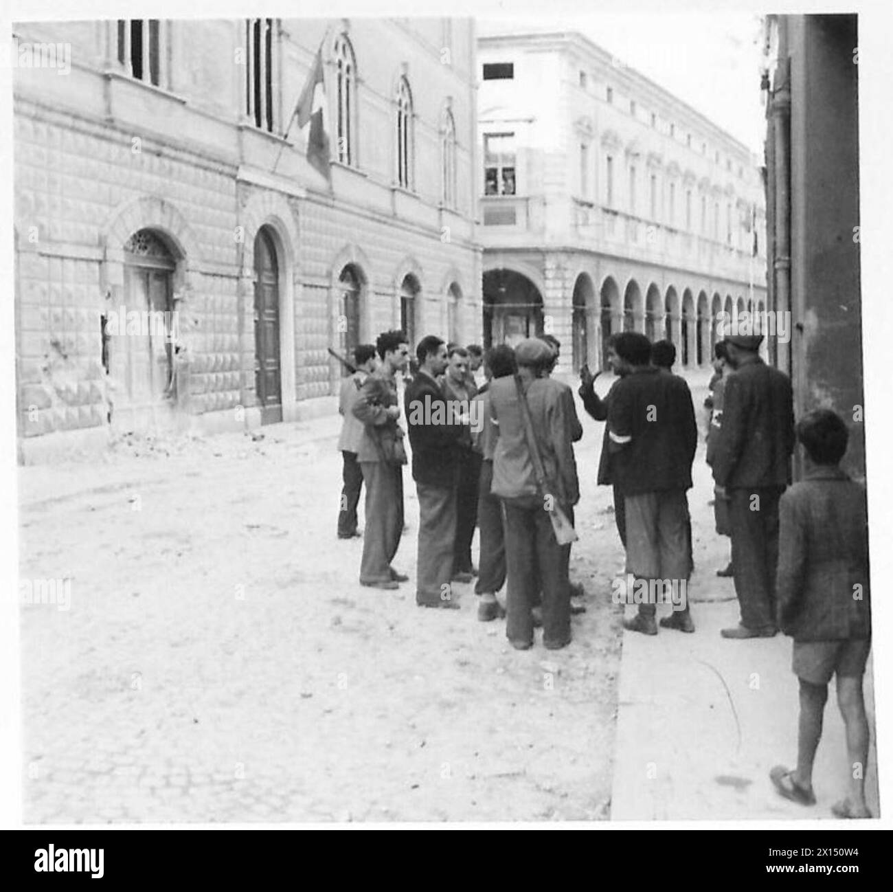 Italian patriots hold a council of war in a side street of Cesena ...
