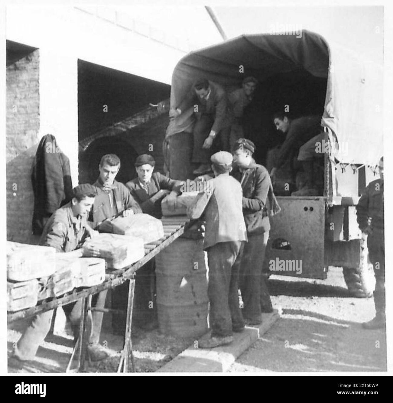 EIGHTH ARMY : LIFE BLOOD OF AN ARMY - A 3-ton truck is loaded with ...