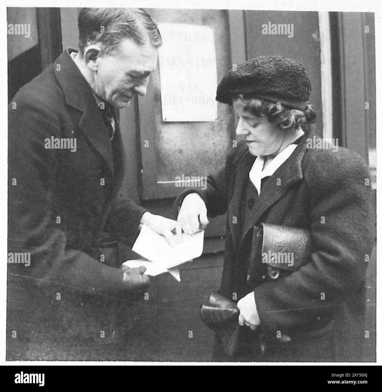 AN ARMY RECORDS OFFICE - Mrs. Cartwright, a soldier's next-of-kin ...