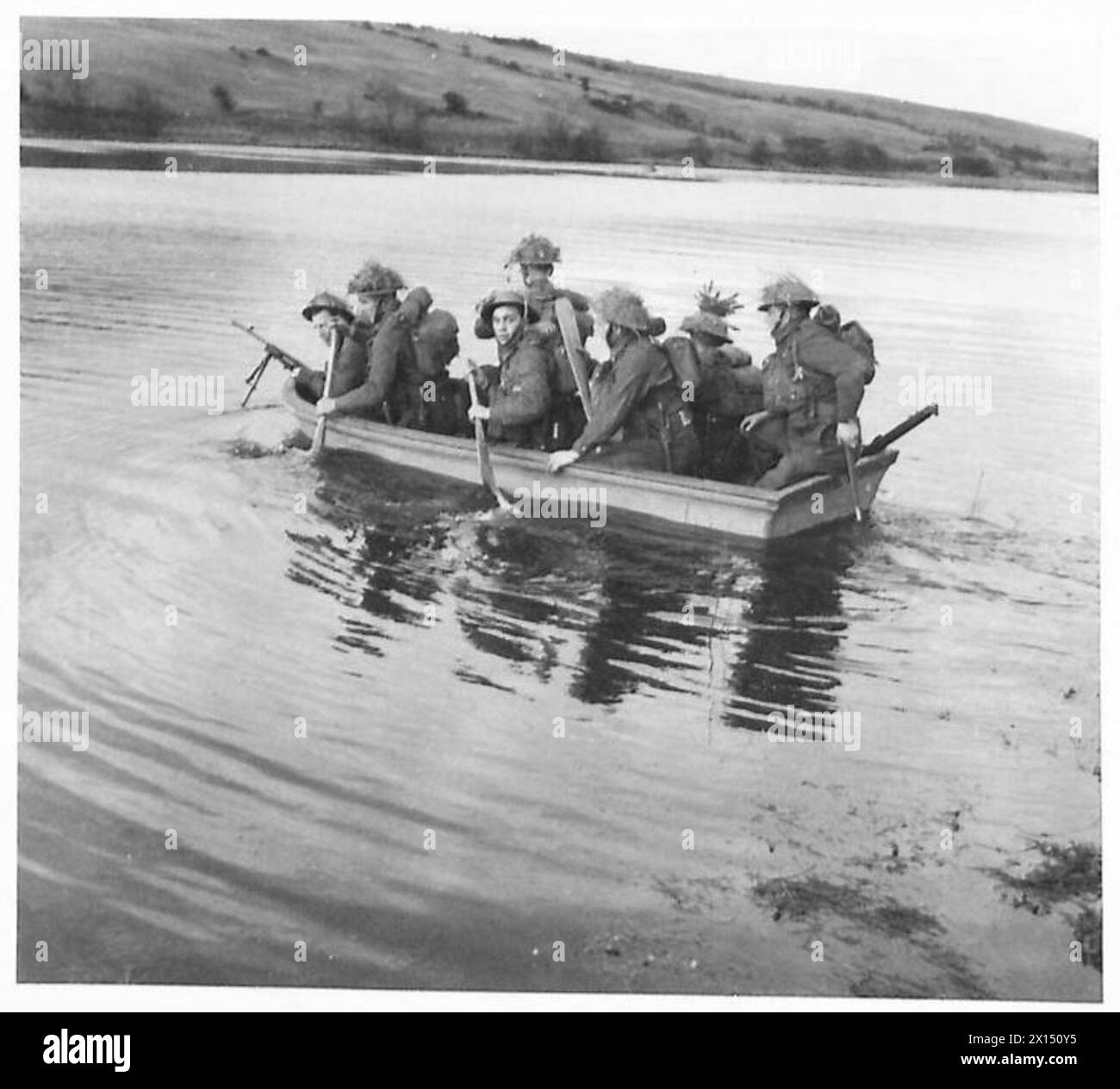 DOMESTIC EFFICIENCY FIRST - Troops crossing a river in collapsible ...