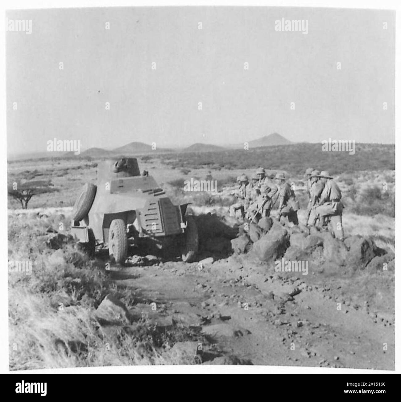 MAJOR-GENERAL G.E. BRINK, D.S.O. INSPECTS THE FORWARD POSITIONS ON THE ...
