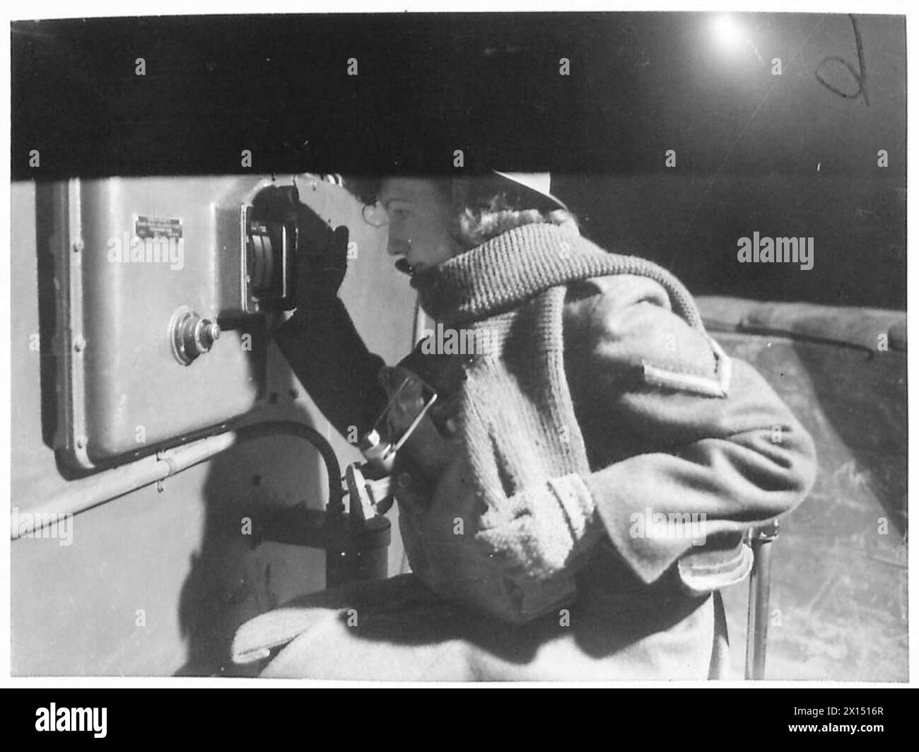 ATS anti-aircraft personnel monitor instruments on the range-finder ...