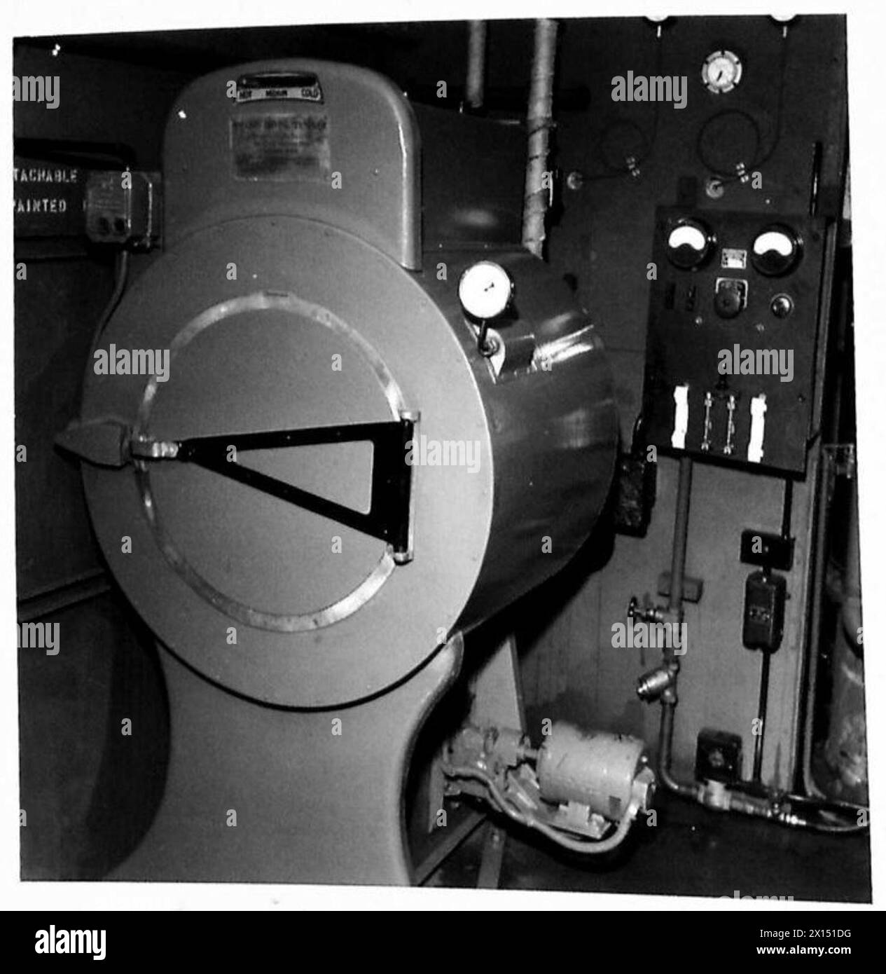Interior view of a mobile dry cleaning plant used by the British Army ...