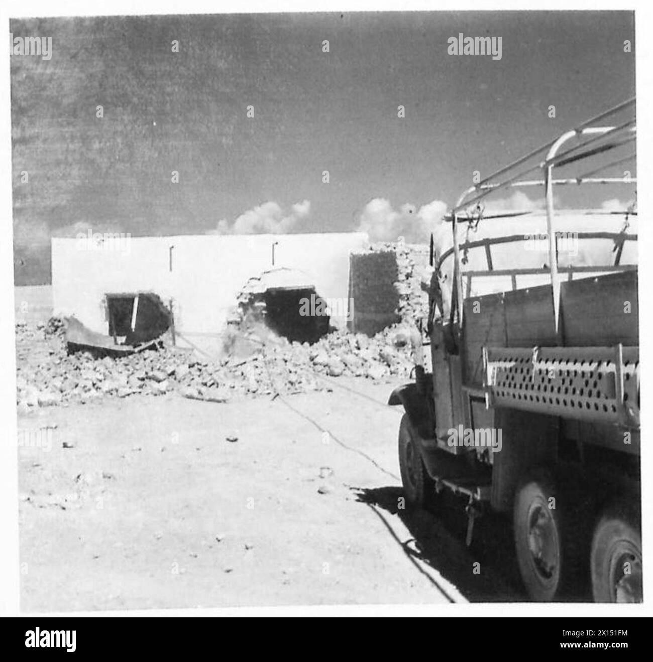 British Army personnel demolish a native house in the Western Desert to ...