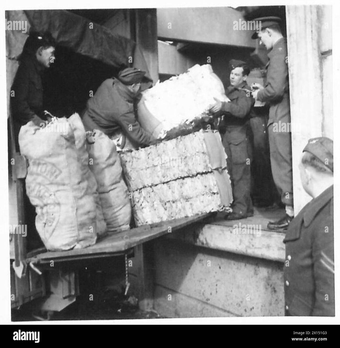 ARMY SALVAGE - Bales of waste paper ready for removal to the mills for ...