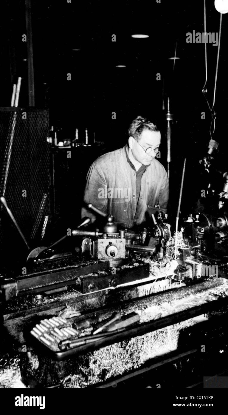 MEN BEHIND BRITAIN'S SHIPS. APRIL 1945, LIVERPOOL. ACTIVITIES OF ...