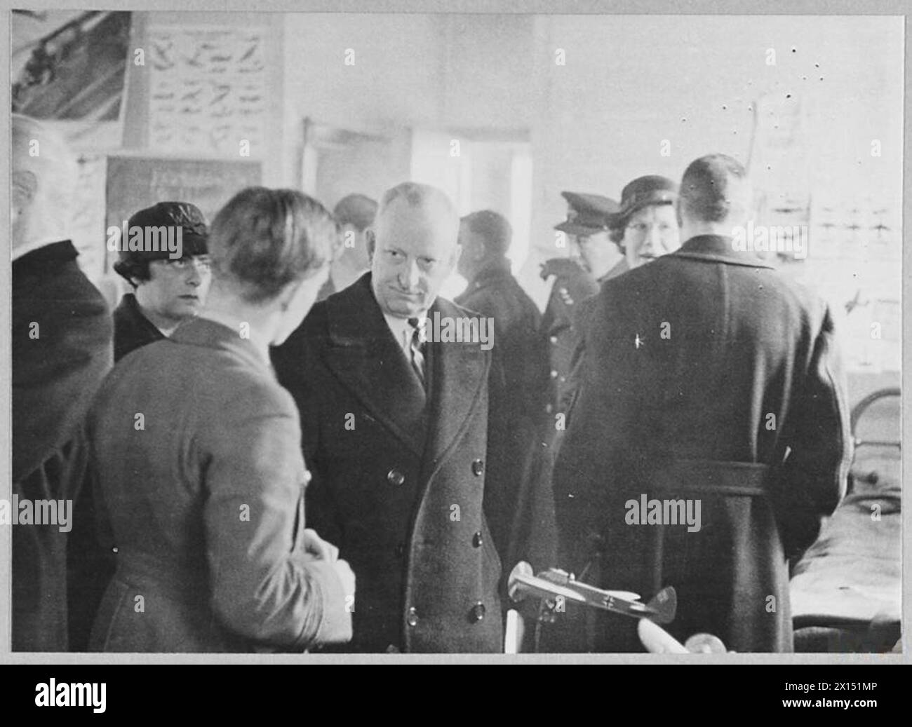 National commander Milo Warner of the American Legion is shown visiting ...