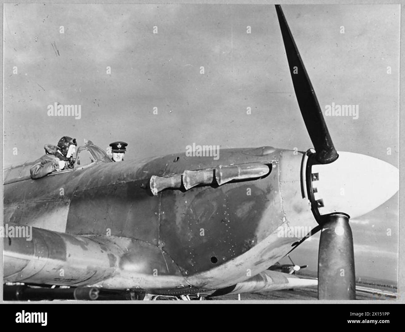 "TOP SCORE" FIGHTER PILOT, D.F.M. & BAR. - 8457 In the cockpit of a ...