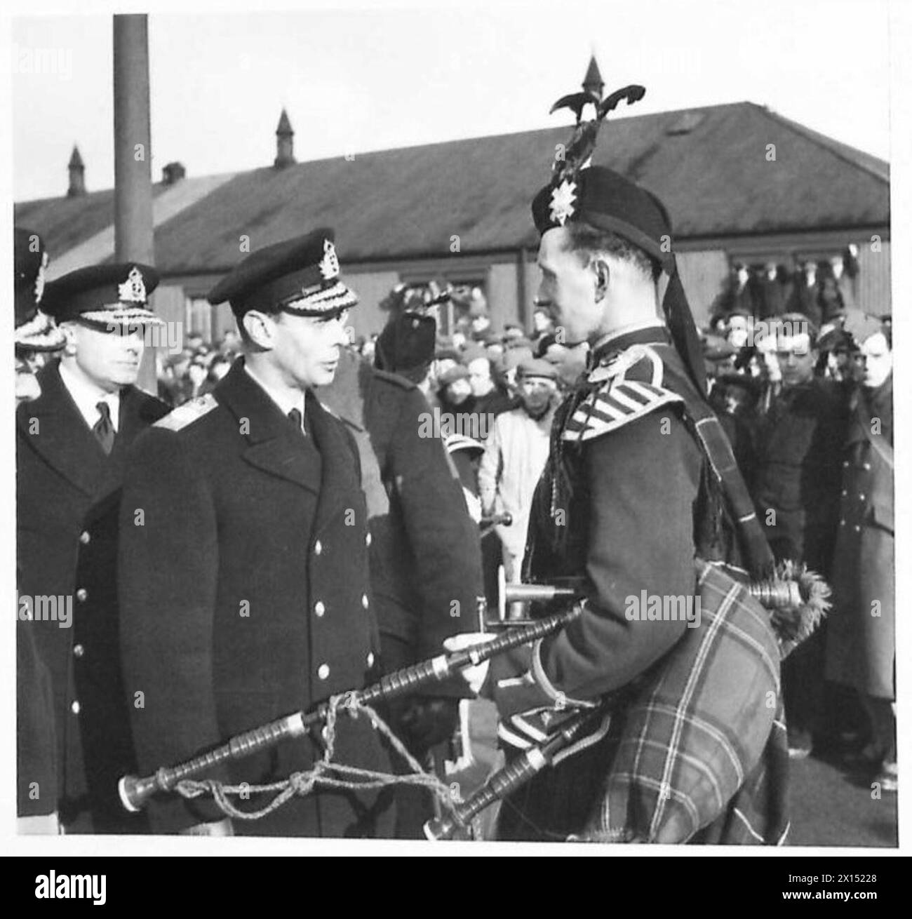 THE KING AND QUEEN IN SCOTLAND - His Majesty chatting to the Pipe Major ...
