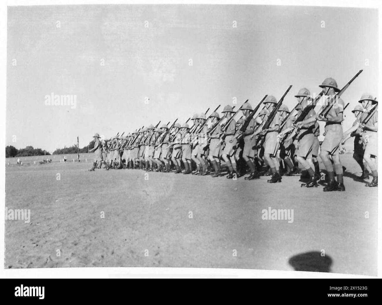 Members of a County Regiment march in formation during a military ...