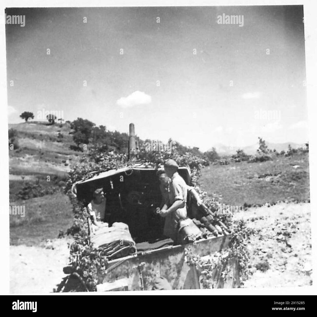 EIGHTH ARMY : THE LANCERS ON PATROL - A 75 mm gun mounted on a half ...