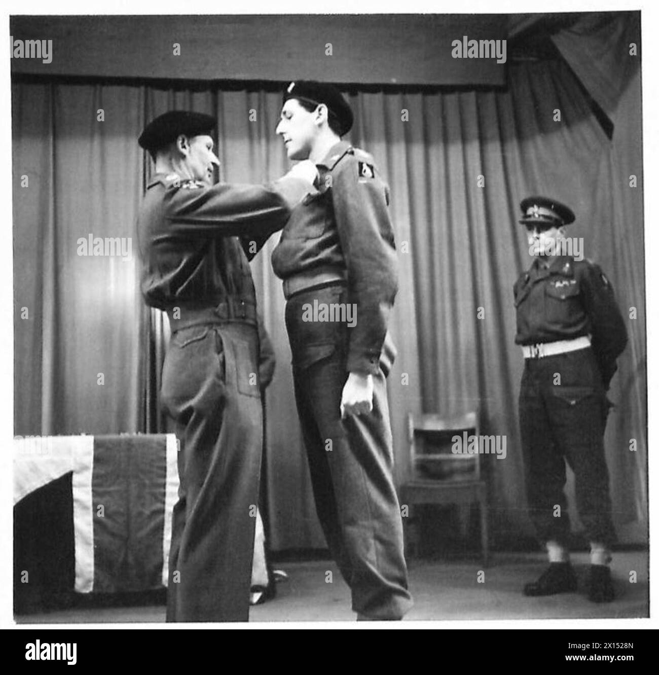 INVESTITURE BY FIELD MARSHAL MONTGOMERY - Lt Fitzgerald 5 DG receives ...