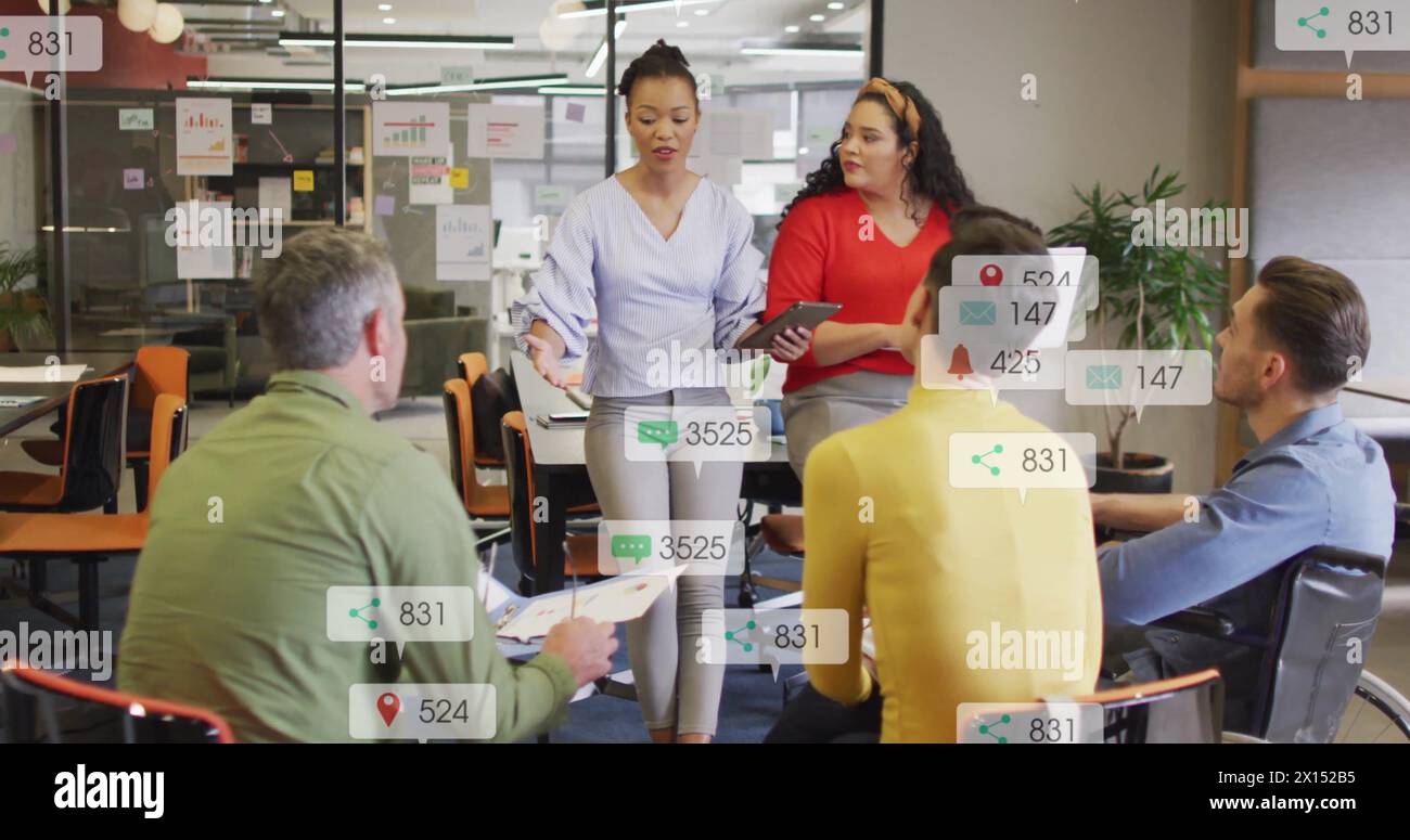 Image of multiple notification bars over diverse coworkers sharing ...