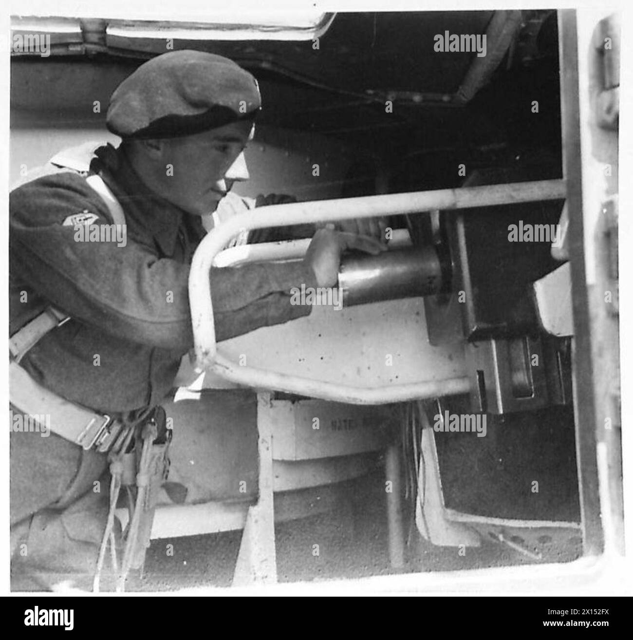 The loader operates the 75 mm gun of the American General Grant medium ...