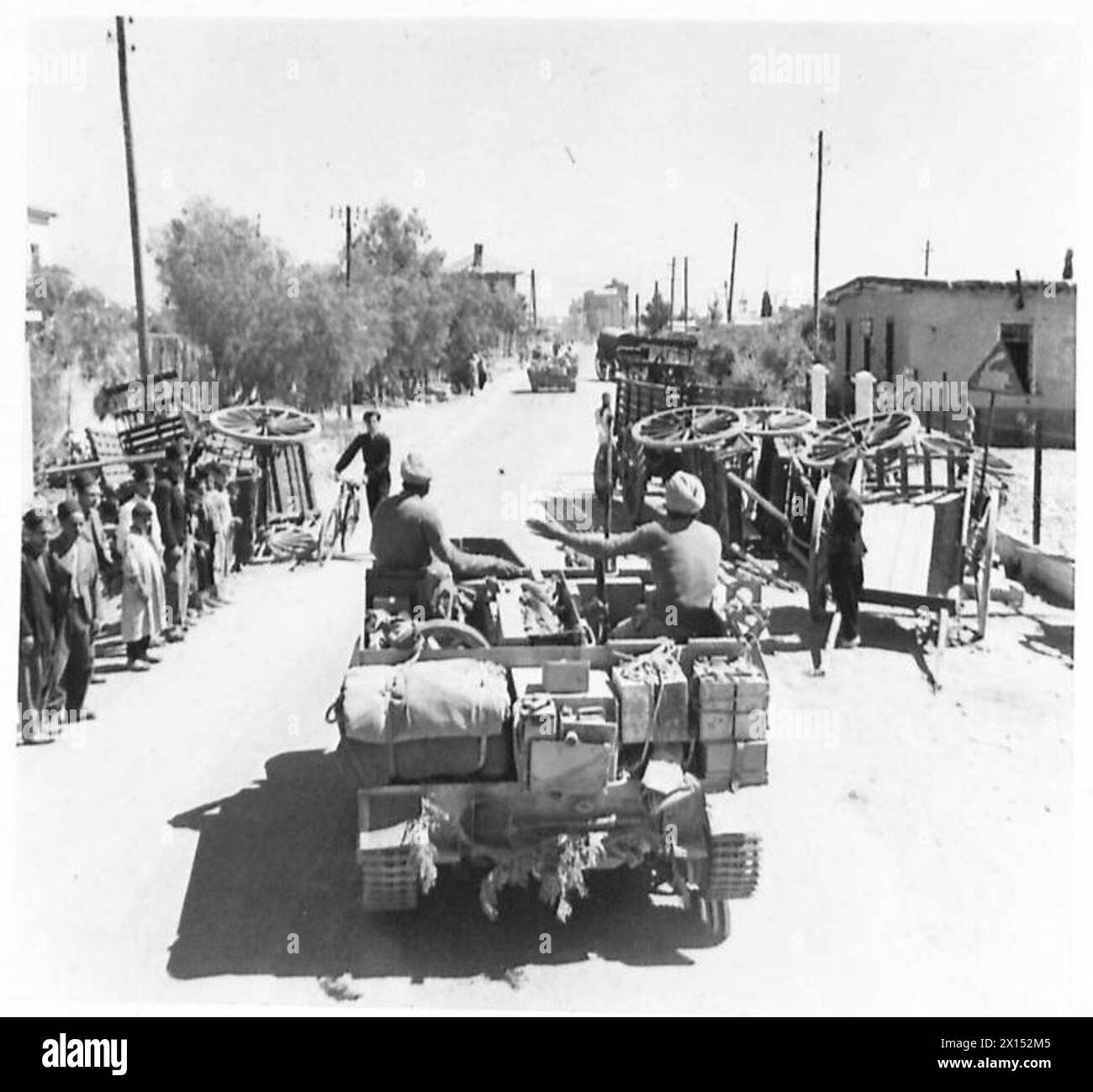 THE FALL OF DAMASCUS - Bren gun carriers of an Indian Division passing ...