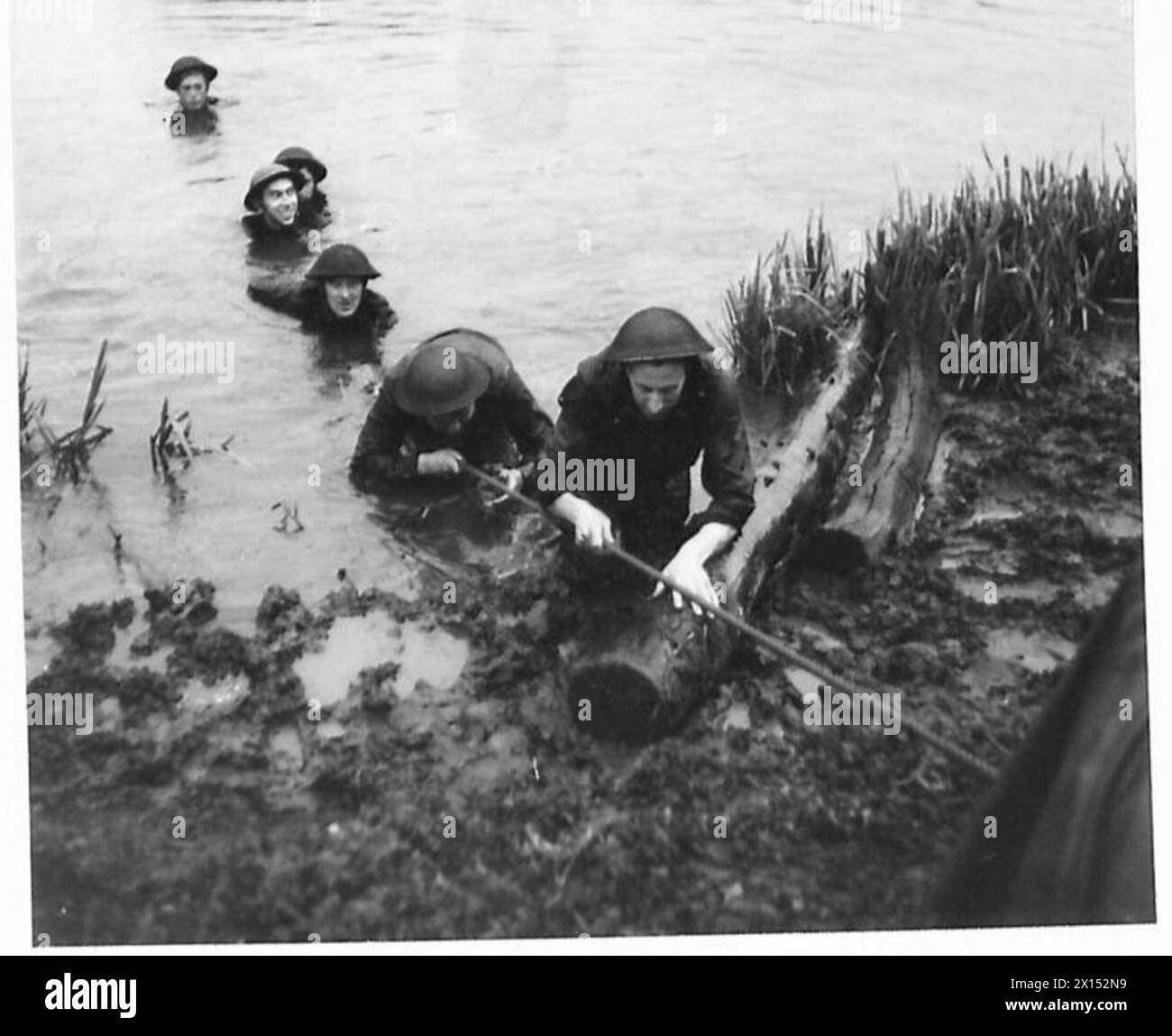 HOME GUARDS SWIM RIVER - The platoon of Home Guard near the opposite ...