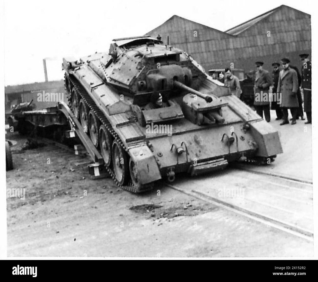 A Crusader tank is positioned on a 50-ton ramp ladder for transport or ...