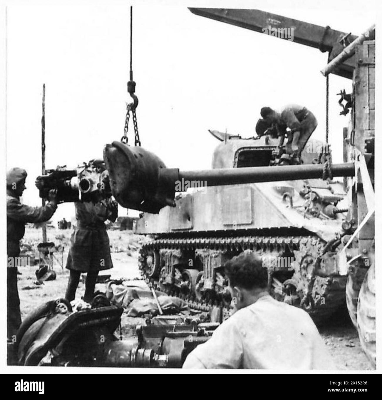 EIGHTH ARMY : VARIOUS - This Sherman tank was hit by an 88 mm shell ...