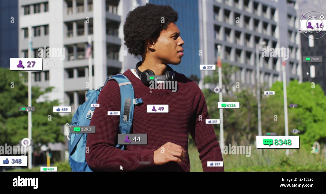 Image of changing numbers, icons over biracial man standing and looking at smartwatch Stock ...