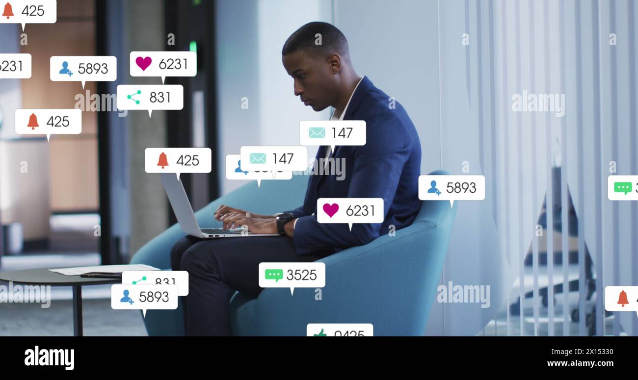 Image of notification bars over african american man working on laptop ...