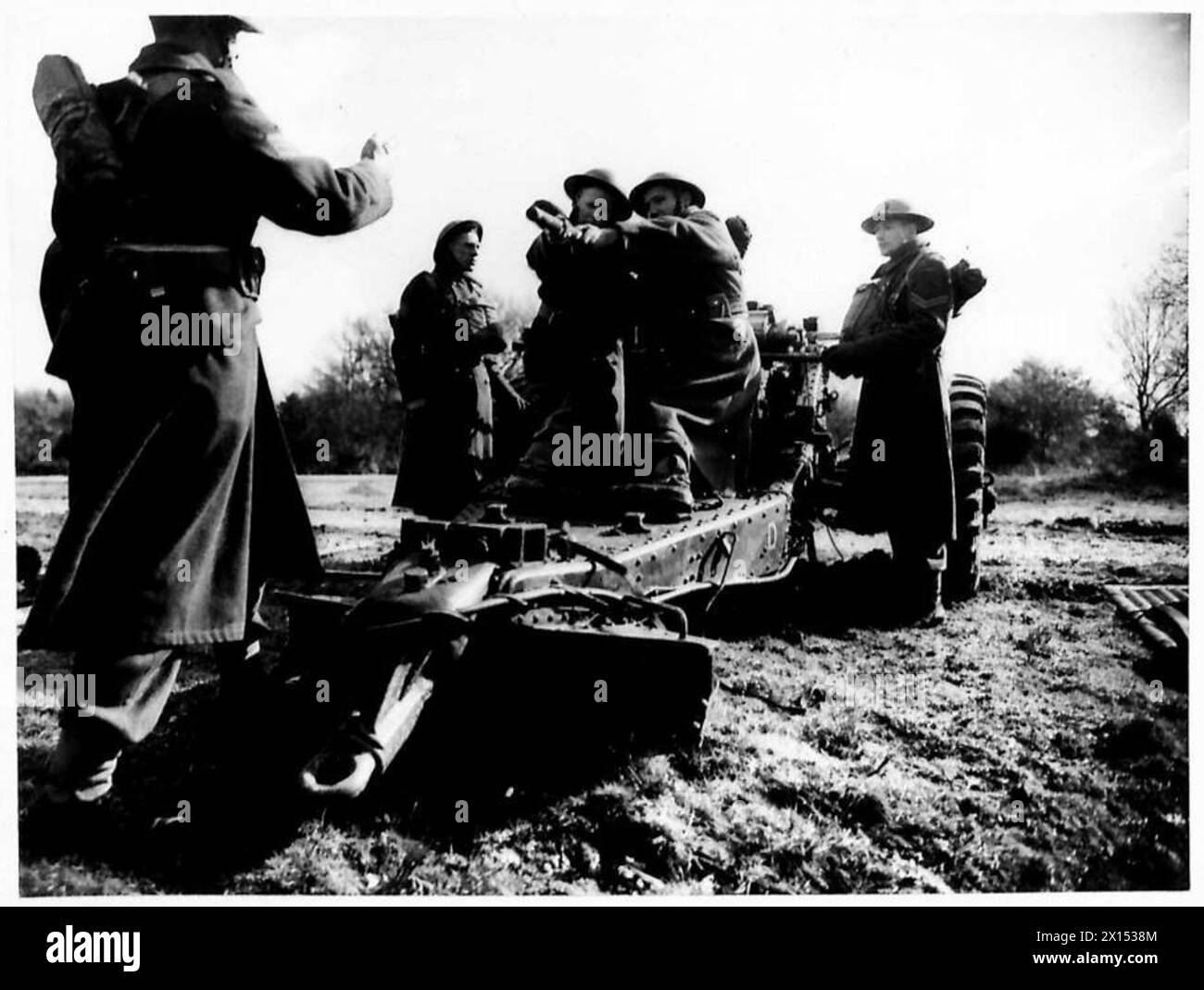 THE GUNNERS TRAIN FOR SPEED - Ramming home the shell British Army Stock ...
