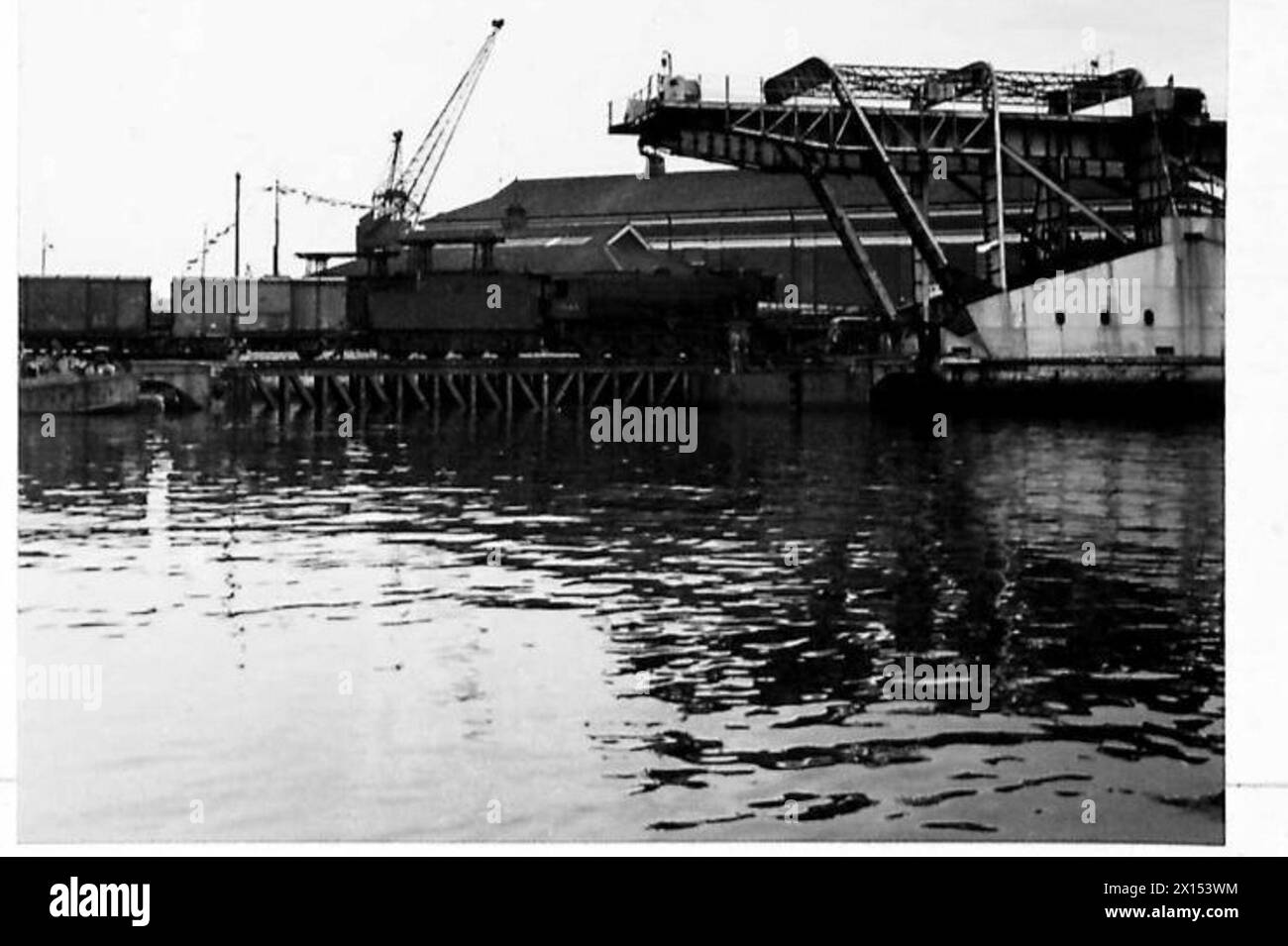 PERMANENT RAMP BRIDGE FOR TRAIN FERRY - A"2-8.0" engine being loaded ...