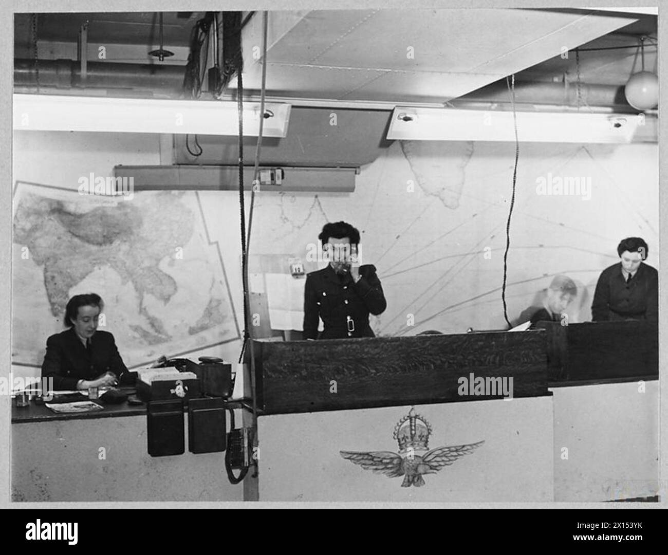 R.A.F. TRANSPORT COMMAND OPERATIONS ROOM - Picture (issued 1945) shows ...