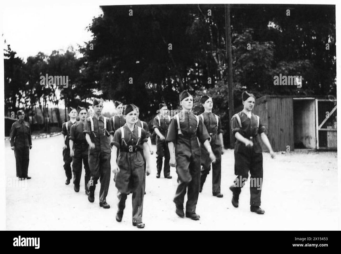 Young British Army recruits perform marching exercises and rifle drills ...