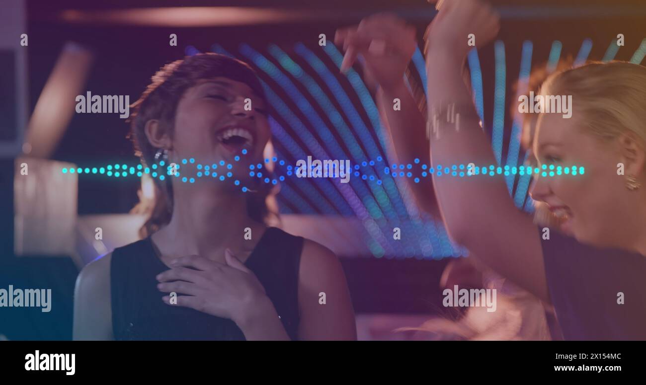 Image of spots moving over smiling caucasian group of friends dancing ...