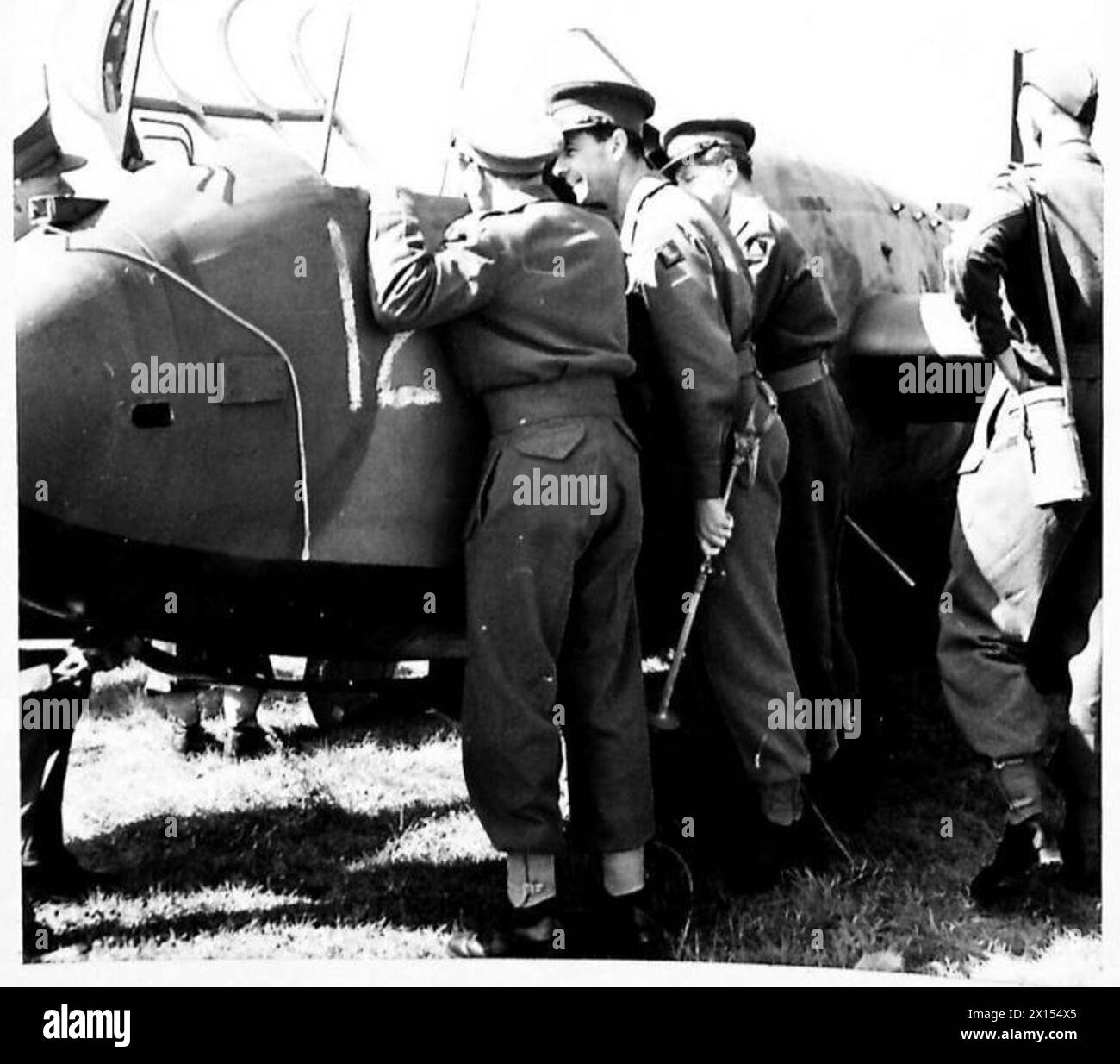 General Ozane of the 76th Division inspects the cockpit of a Hotspur ...