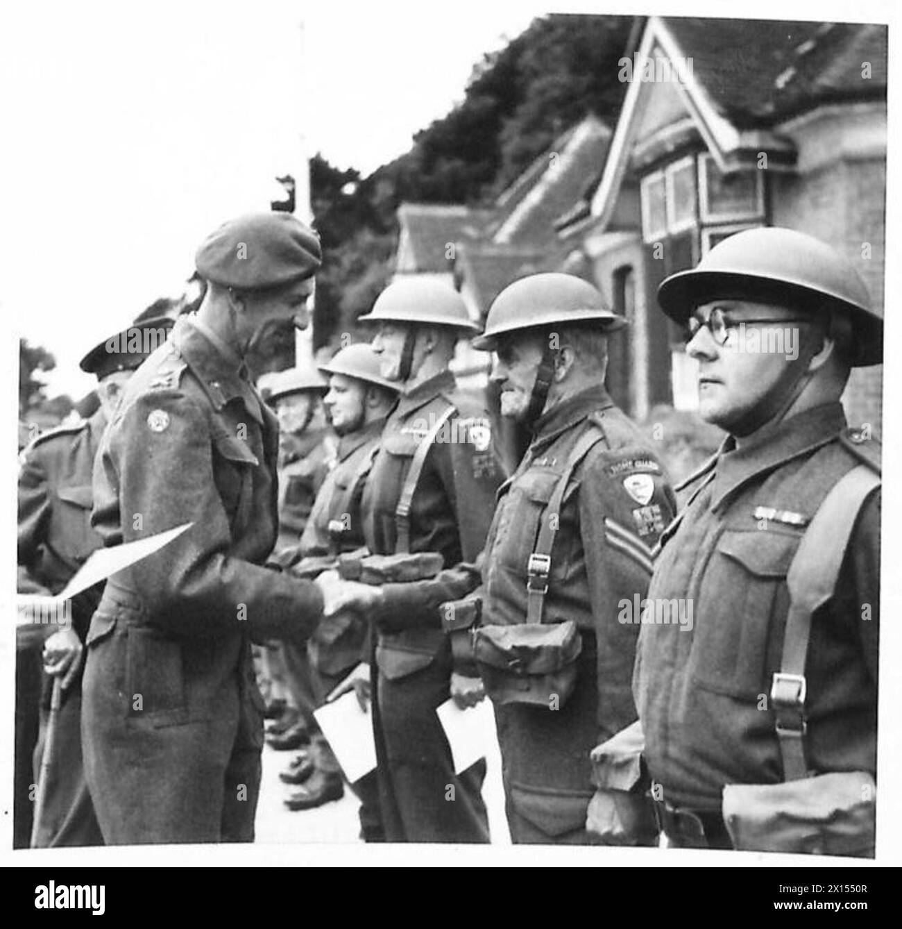 Lieutenant General Schreiber presents a Certificate of Merit to ...