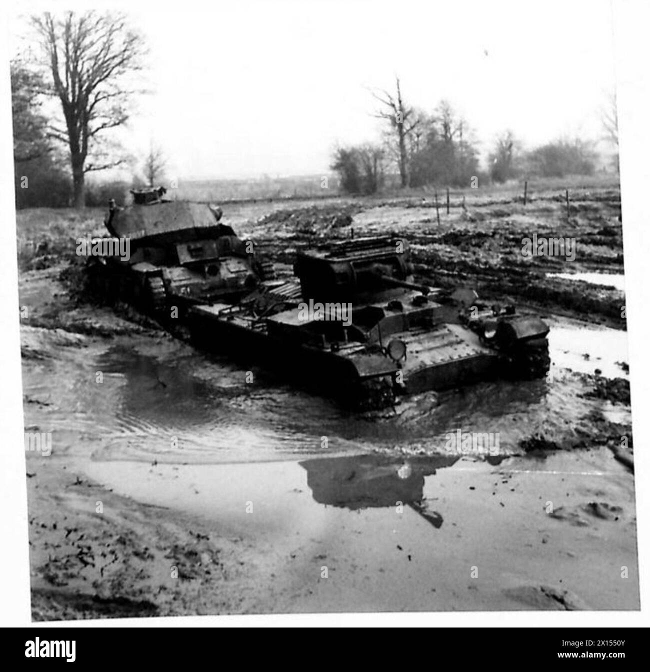 A MUD TEST FOR TANKS - The Valentine successfully tows another tank ...